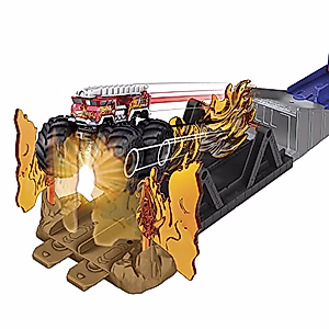 Hot Wheels Monster Trucks Fire Through Playset with 1:64 Scale Die-Cast 5-Alarm Toy Truck, Launcher & Spinning Flames
