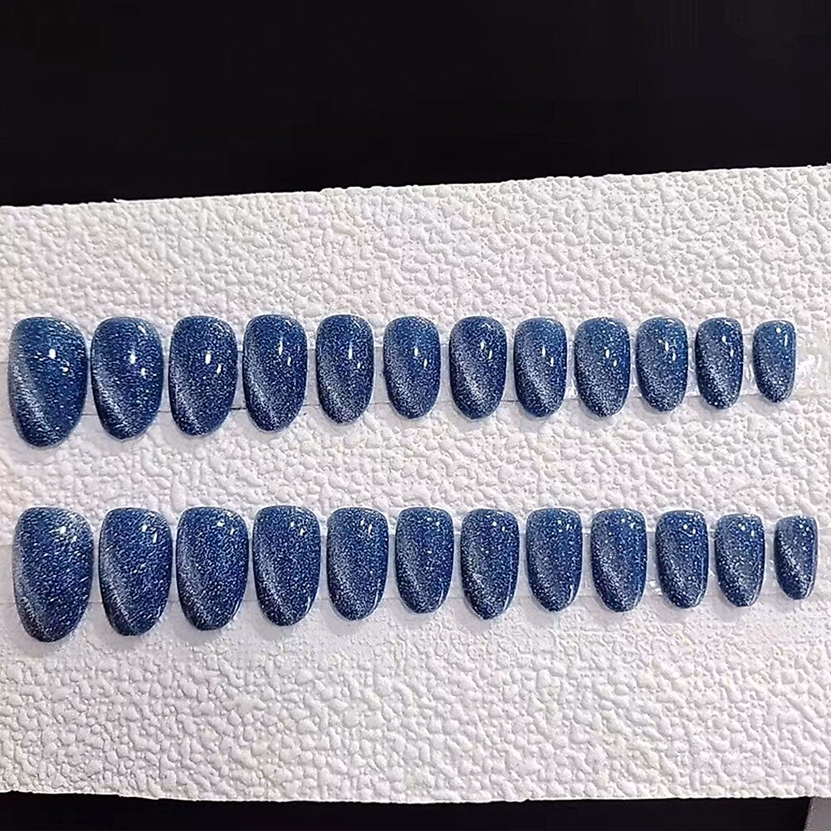 Short Press on Nails Medium Almond Cat Eye Fake Nails False Nails with Glitter Sparkly Designs Blue Full Cover Acrylic Nails Light Luxury and Glossy Artificial Nails for Women 24Pcs