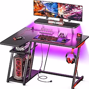MOTPK L Shaped Gaming Desk with LED Lights & Power Outlets, Small Gaming Computer Desk 39inch with Storage Shelf, Corner Desk with Carbon Fiber Texture, Gamer Desk Gaming Table, Black