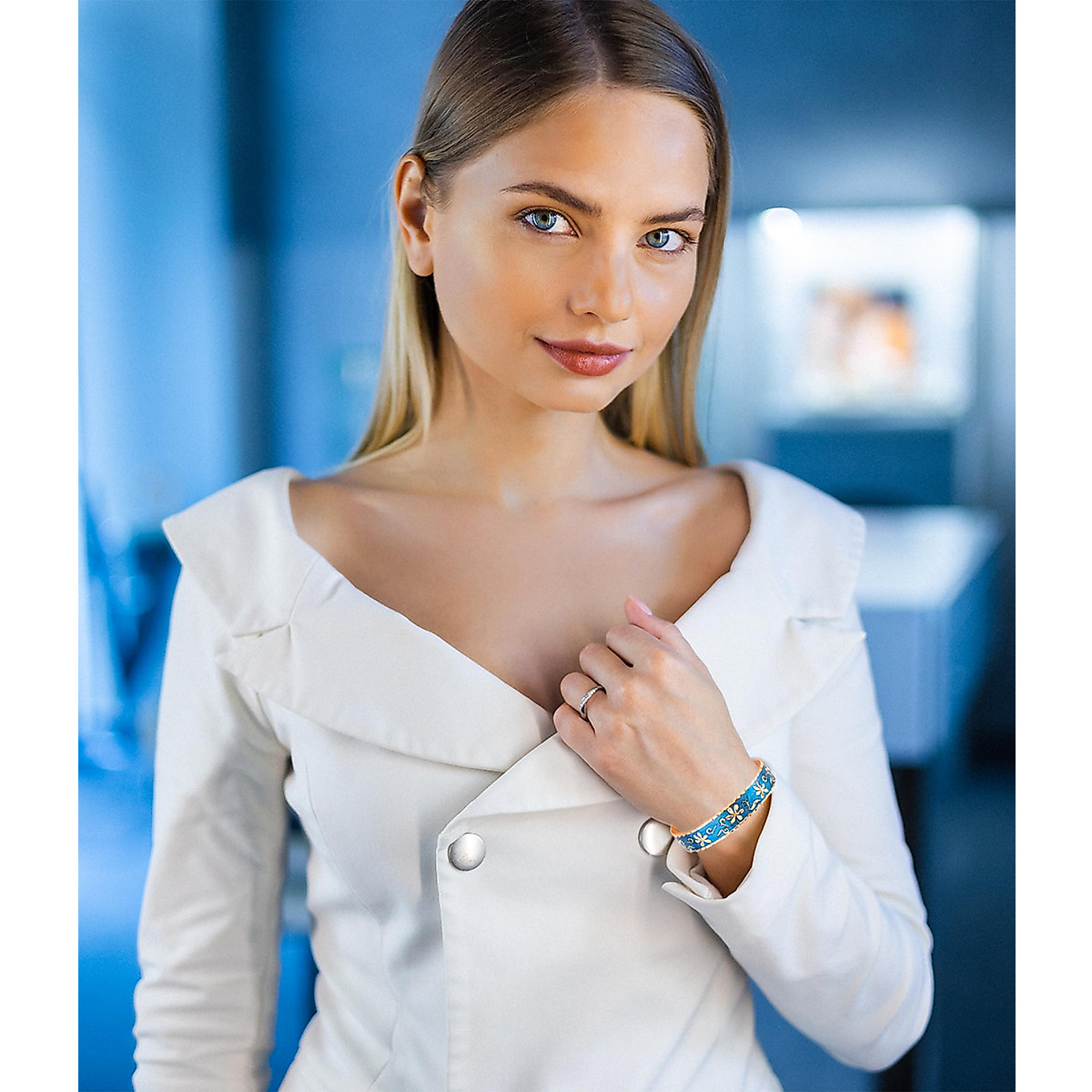Women's Daisy Flower Bracelets feature a beautiful daisy flower on a blue copper cuff with an open-ended flower cuff design. These copper bracelets are adjustable for a perfect fit—BNF-06.
