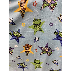 Disney Toy Story 4 Character Stars on Sky Blue Fleece from Springs Creative Buzz Light Year and Woody Fabric by The Yard