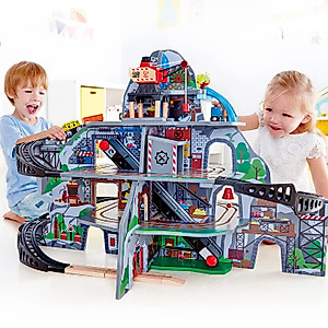 Hape Wooden Railway Mighty Mountain Mine Railway Playset| 4-Level Railway Train Track Playset with Crane and Magnetic Train Cars for Kids