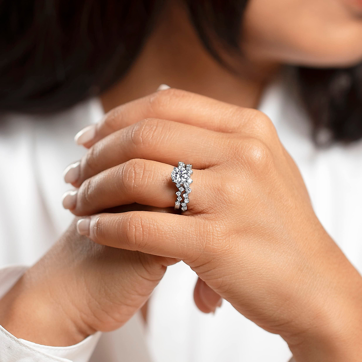 PEORA 1.50 Carats Moissanite Engagement Ring and Wedding Band Bridal Set Scattered Side Stones 925 Sterling Silver, Round Brilliant Shape, D-E Color, VVS Clarity, Size 10