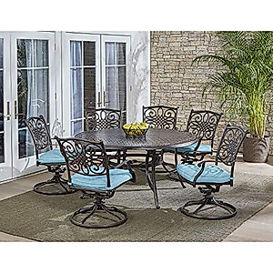 Hanover 7-Piece Traditions 60" Round Cast-Top Table and 6 Swivel Rockers with Blue Cushions, Patio Dining Set for 6, Premium Weather Resistant Outdoor Furniture