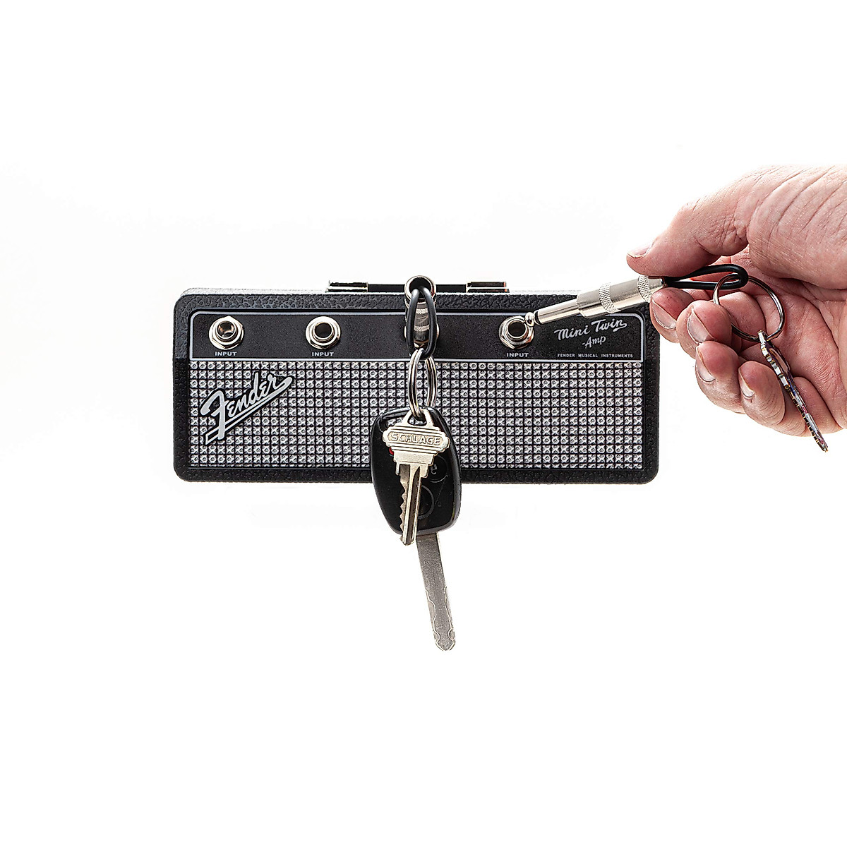 Licensed Fender Jack Rack- guitar amp key holder, includes 4 guitar plug keychains and 1 wall mounting kit. Quick and easy installation.
