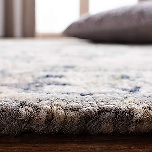 SAFAVIEH Aspen Collection Accent Rug - 4' x 6', Ivory & Blue, Handmade Boho Braided Tassel Wool, Ideal for High Traffic Areas in Entryway, Living Room, Bedroom (APN125A)