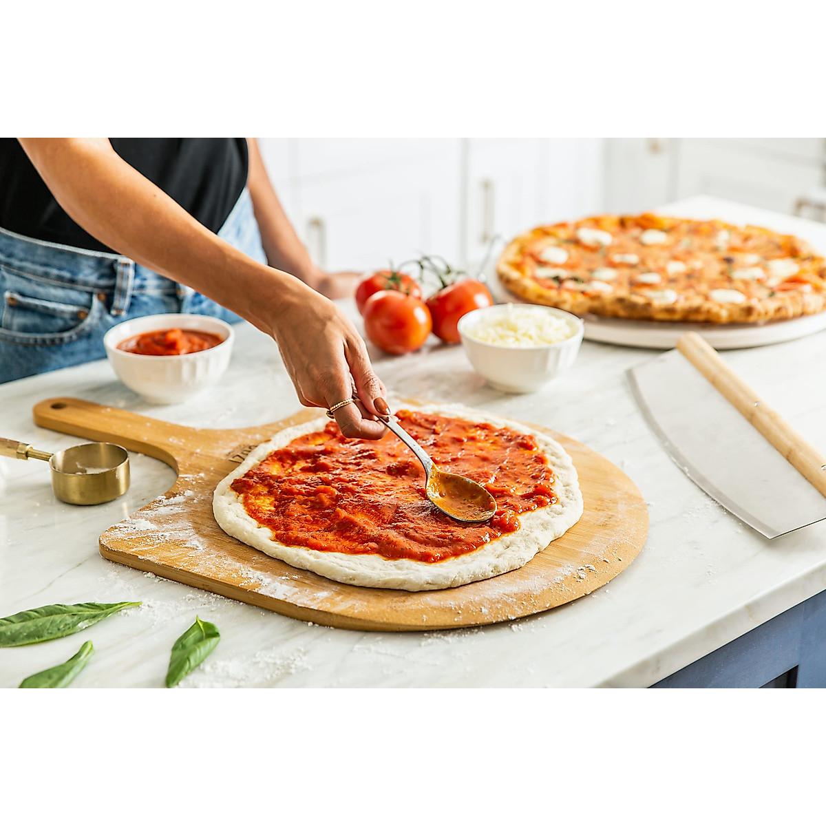 Cuzi Gourmet 4-Piece Large Pizza Stone Set - 13" Thermal Shock Resistant Cordierite Pizza Stone with Handle Rack, 19" Natural Bamboo Pizza Peel & Pizza Cutter - Large Baking Stone for Grill and Oven