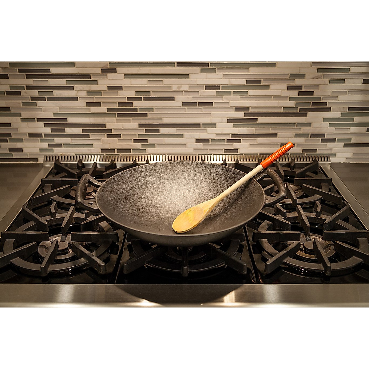 It's useful. 14 Inch Cast Iron Wok with Handles and Built in Base