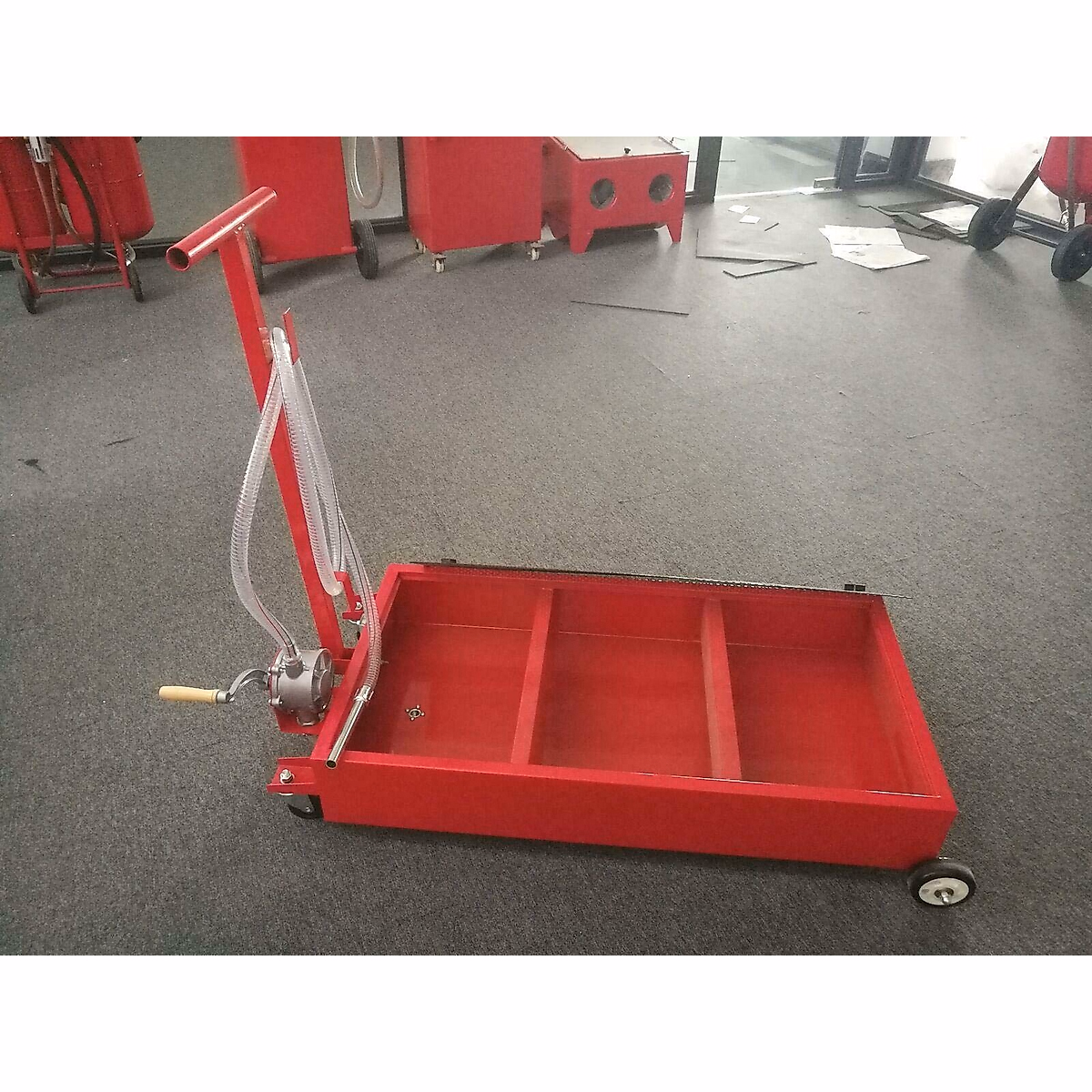 Manoch 20 Gallon Oil Drain Pan Low Profile Dolly with Pump 8 feet Hose and Wheel Material: Iron Overall Dimensions: (51.57 x 25.2 x 31.5)" / (131 x 64 x 80) cm (L x W x H) Casters: 4-inch (10 cm)