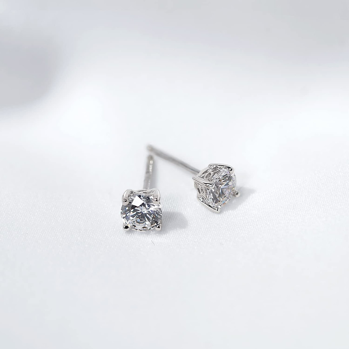 Amazon Essentials Platinum Plated Sterling Silver Stud Earrings set with Round Cut Infinite Elements Cubic Zirconia (1 cttw) (previously Amazon Collection)