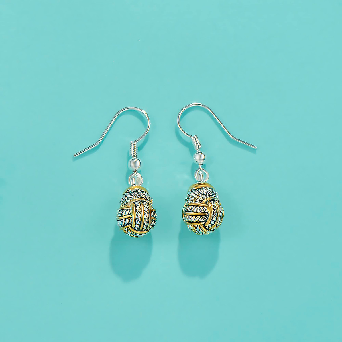 UNY Jewel Jewelry Make a Statement With Our Two Tone Twisted Cable Wire Dangle Ball Fish Hook Earrings Featuring Detailing Perfect For Any Occasion