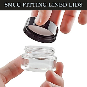 Cornucopia 15-Milliliter Clear Glass Balm Jars (12-Pack); 1/2 oz Cosmetic Jars with Lined Black Plastic Lids