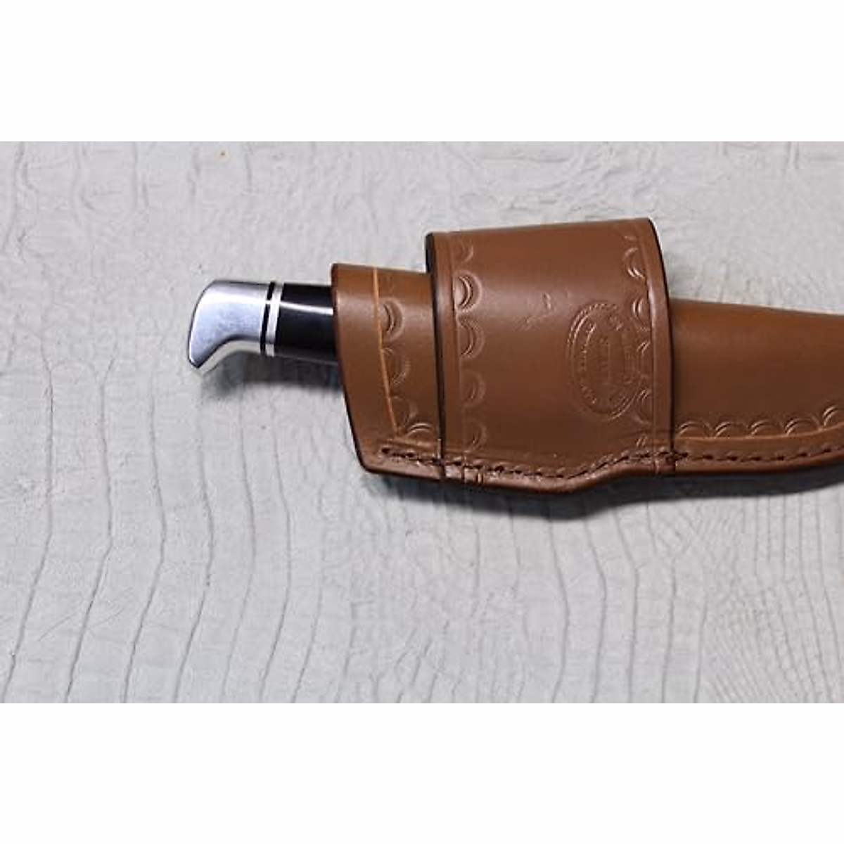 CARL THOMAS LEATHERS Crossdraw knife sheath. quality leather quality stitching. fix blade Nylon stitching. may defeat a 103. Knife holder.