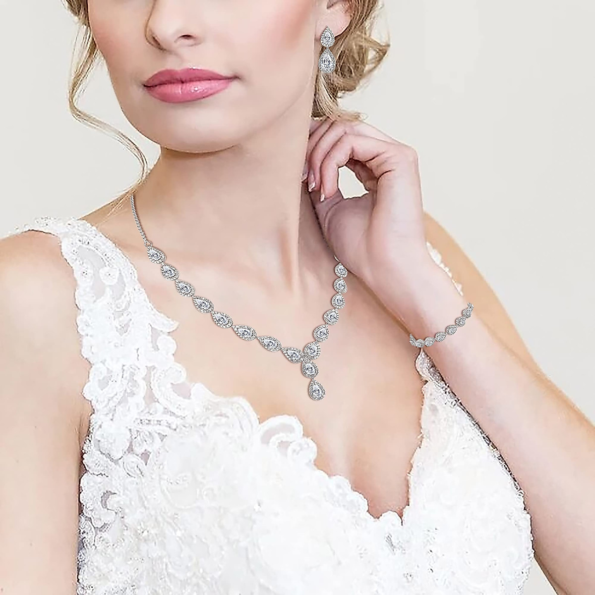 BriLove Wedding Bridal CZ Necklace Bracelet Earrings Jewelry Set for Women Teardrop Infinity Figure 8 Y-Necklace Tennis Bracelet Dangle Earrings Set Clear Silver-Tone April Birthstone