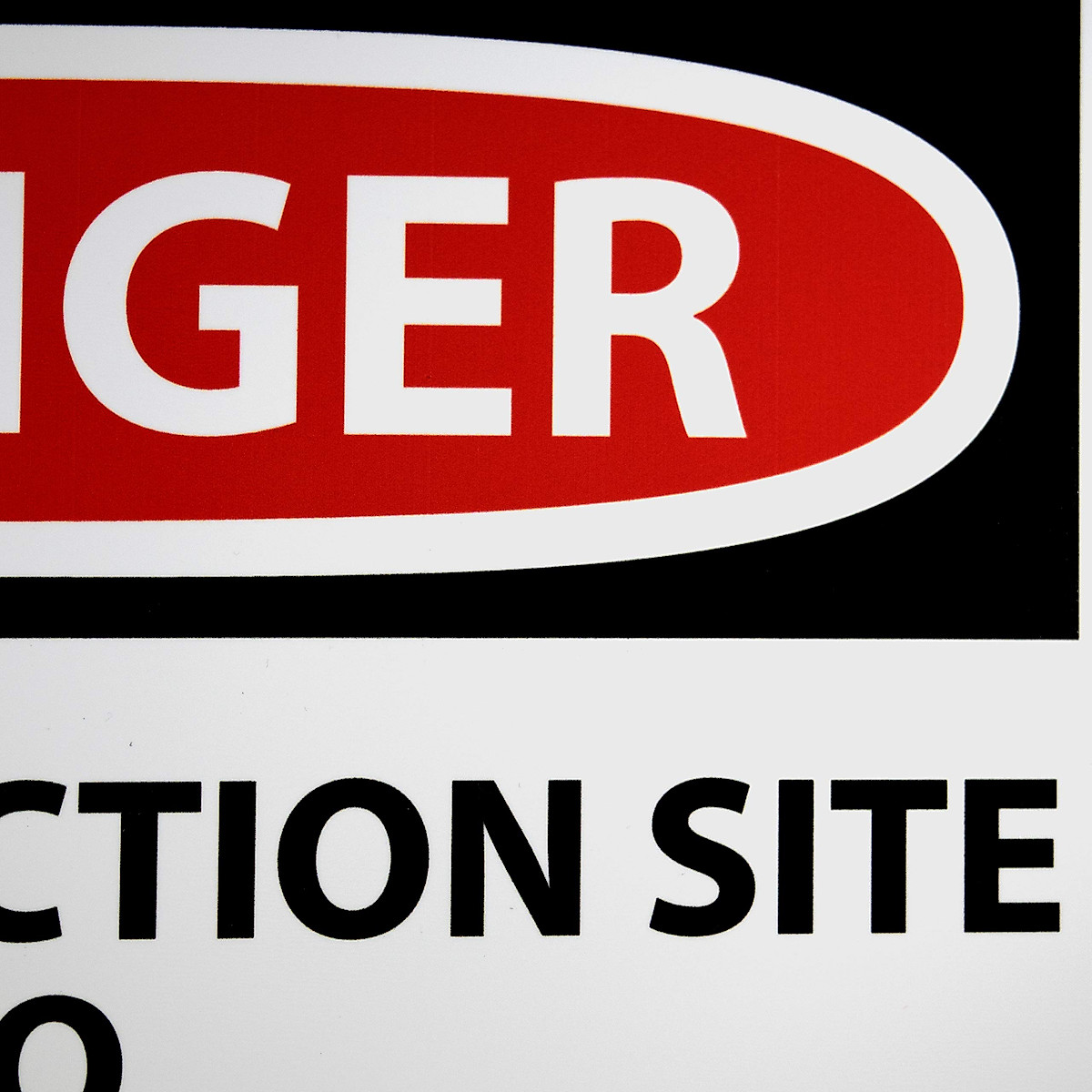 NMC D248RB DANGER - CONSTRUCTION SITE NO TRESPASSING Sign - 14 in. x 10 in. Rigid Plastic Danger Signage, Black/White Text on White/Red Base