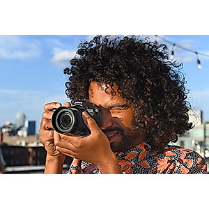 Nikon Z50 + FTZ Mirrorless Camera Kit (209-point Hybrid AF, High Speed Image Processing, 4K UHD Movies, High Resolution LCD Monitor) VOA050K003