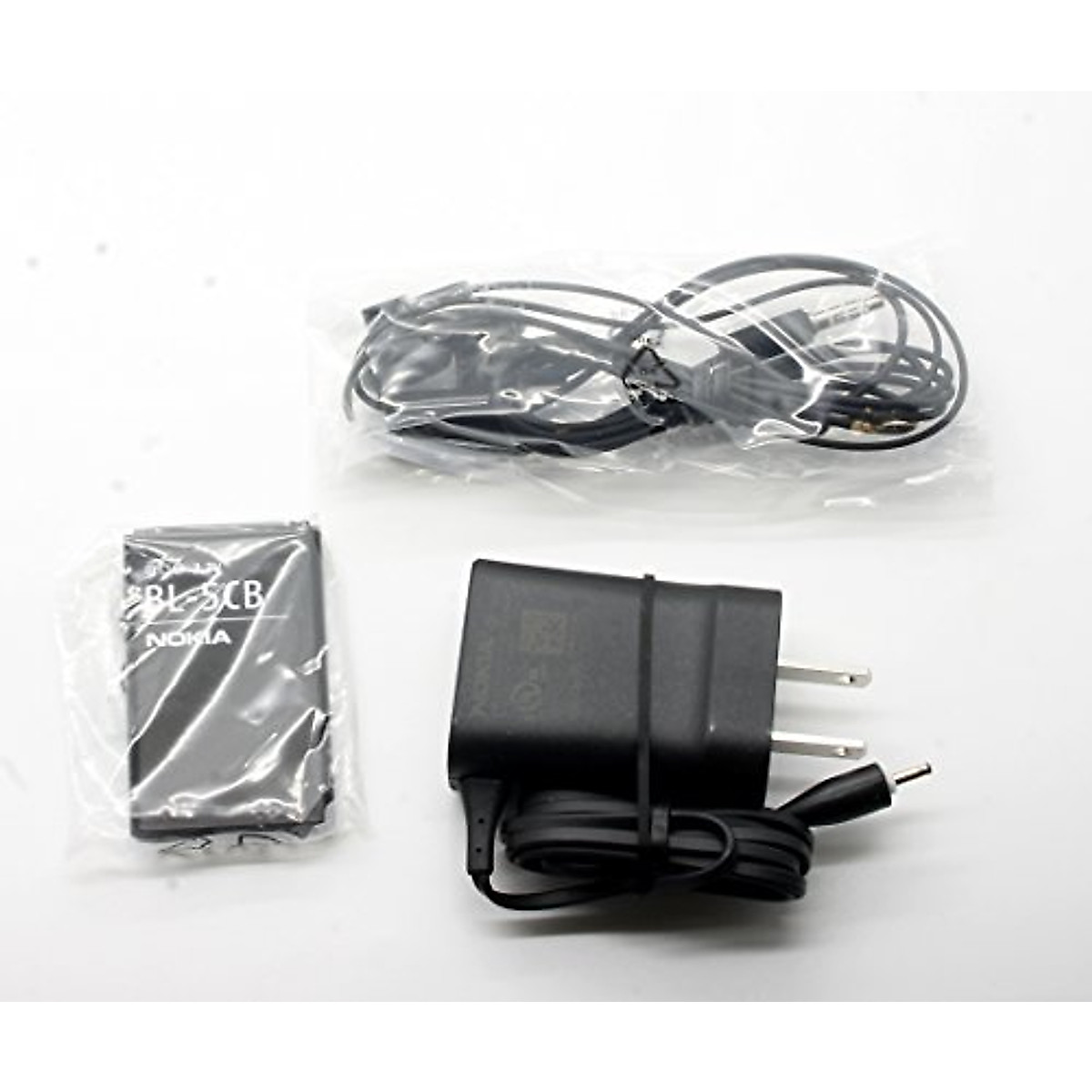 Nokia 106 Unlocked GSM Dual-Band Cell Phone w/SMS and FM Radio - Black