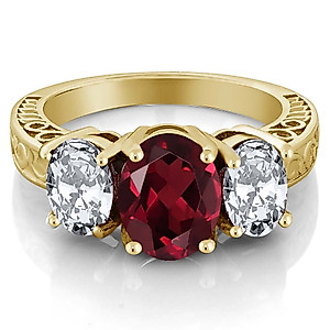Gem Stone King 18K Yellow Gold Plated Silver Oval Red Rhodolite Garnet 3-Stone Ring For Women (5.00 Cttw, Gemstone Birthstone, Available In Size 5, 6, 7, 8, 9)