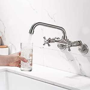 Wesliv Brushed Nickel Wall Mount Kitchen Faucet Double Cross Handle Commercial 3 Inch to 9 Inch Adjustable Spread Mixer Tap with 9 inch Spout Reach, Hot and Cold Water Mixer Tap 360 Rotatable Faucet