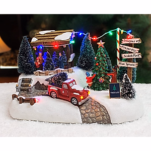 MOMENTS IN TIME Christmas Village Building, Tree Lot with LED Lights and Christmas Music - Battery Operated (not Included) (Optional 4.5V Adapter not Included) (6.9" H x 10.8" W x 7.7" D)