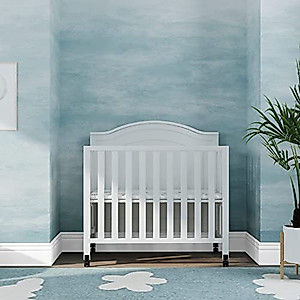DaVinci Charlie Folding Portable 3-in-1 Convertible Mini Crib and Twin Bed in White, Removable Wheels, Greenguard Gold Certified
