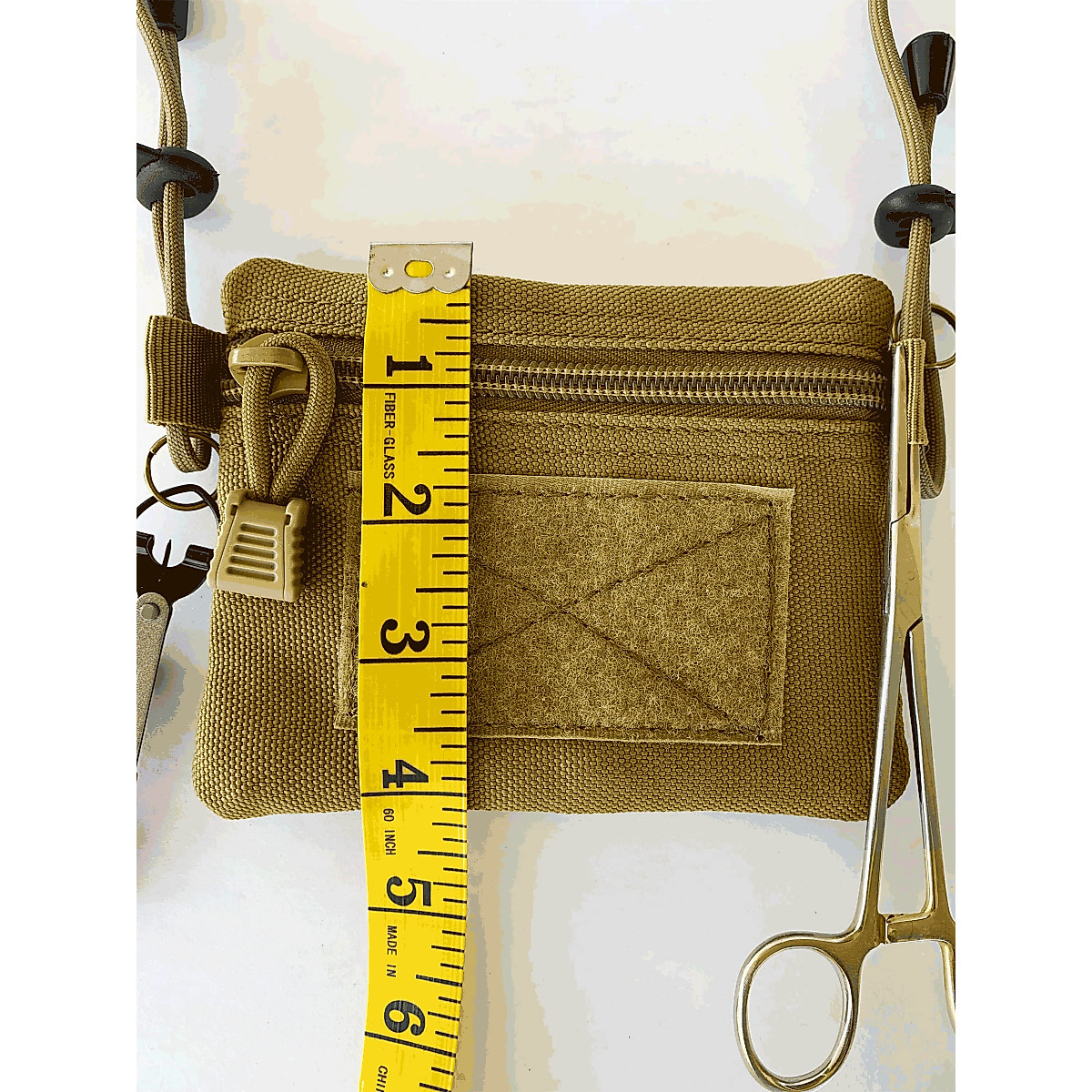 River Canyon - Pouch Lanyard with Nippers - This Fly Fishing Lanyard has a Water-Resistant Zipper Pouch, Nippers are Also Included. There is a Loop to Hang Your hemostat. Two More Rings to Hang Tools