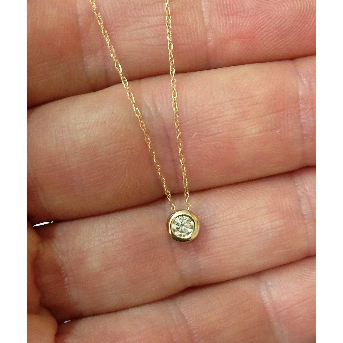 1/4 Ct Diamond Solitaire Bezel Pendant Available in 14k White Or Yellow Gold