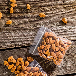 Restaurantware Bag Tek 4.5 x 4 Inch Resealable Zip Bags 100 High Clarity Zip Bags - For Snacks Nuts Seeds Candy Treats & More Clear Plastic Zipper Storage Bags