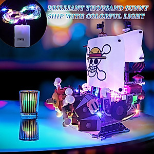 JESGO One Piece Anime Thousand Sunny Ship Building Kit, Featuring 9 Main Action Figures with LED Light Not Compatible with lego, One Piece Merch Pirate Boat Blocks Ideal Gift for Kid, Adult(432 PCS)