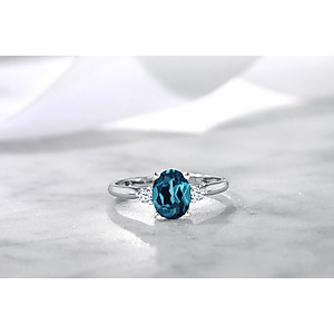 Gem Stone King 10K White Gold London Blue Topaz and White Created Sapphire 3-Stone Women's Ring (1.40 Cttw, Gemstone Birthstone, Available In Size 5, 6, 7, 8, 9)