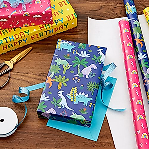 Hallmark Kids Birthday Wrapping Paper (3 Rolls: 75 sq. ft. ttl) Pink Rainbows, Blue Dinosaurs, Yellow "Happy Birthday"