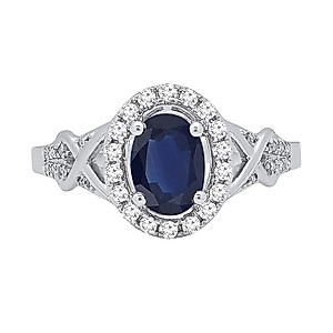 Dazzlingrock Collection 7x5mm Oval Blue Sapphire & Round White Diamond Split Shank Halo Engagement Ring for Women (0.25 ctw, Color I-J, Clarity I2-I3) in 10K White Gold, Size 7.5