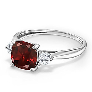 Gem Stone King 10K White Gold Red Garnet and White Moissanite 3 Stone Engagement Ring For Women (2.11 Cttw, Cushion 7MM, Gemstone January Birthstone) (Size 5)