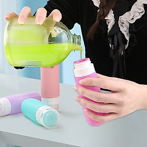 Xerhnan Leakproof Silicone Travel Bottles Carry On Refillable Portable Liquid Containers for Shampoo, Conditioner, Lotion, Toiletries (4PCS,Rose,Purple,Blue,Pink)