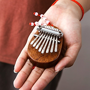 Mini Kalimba 8 Keys Thumb Piano Cute Portable Exquisite Oval Finger Piano Musical Instrument Sapele Wood Marimba Good Accessory Pendant Gift for Kids Adult Beginners