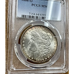 1884 O Morgan silver dollar, bright, reddish bronze rim toning $1 PCGS MS-64