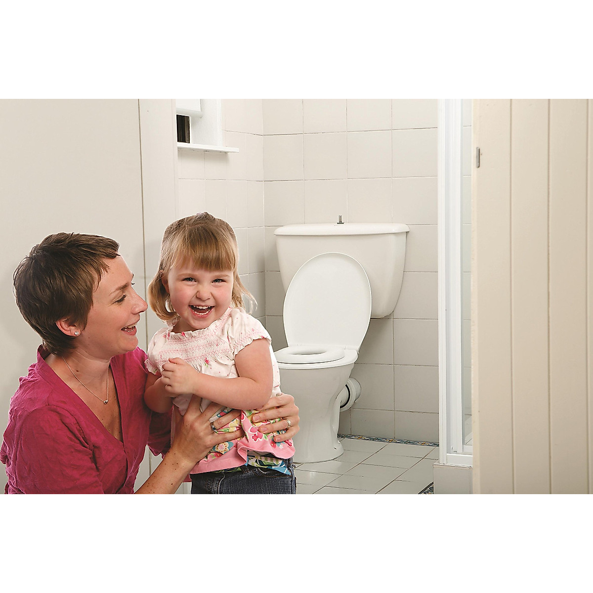 Dreambaby Soft Touch Potty Seat - Comfortable Padded Seat - With High Base Underneath for Secure Positioning - Fit Most Standard Toilets - White - Model L604