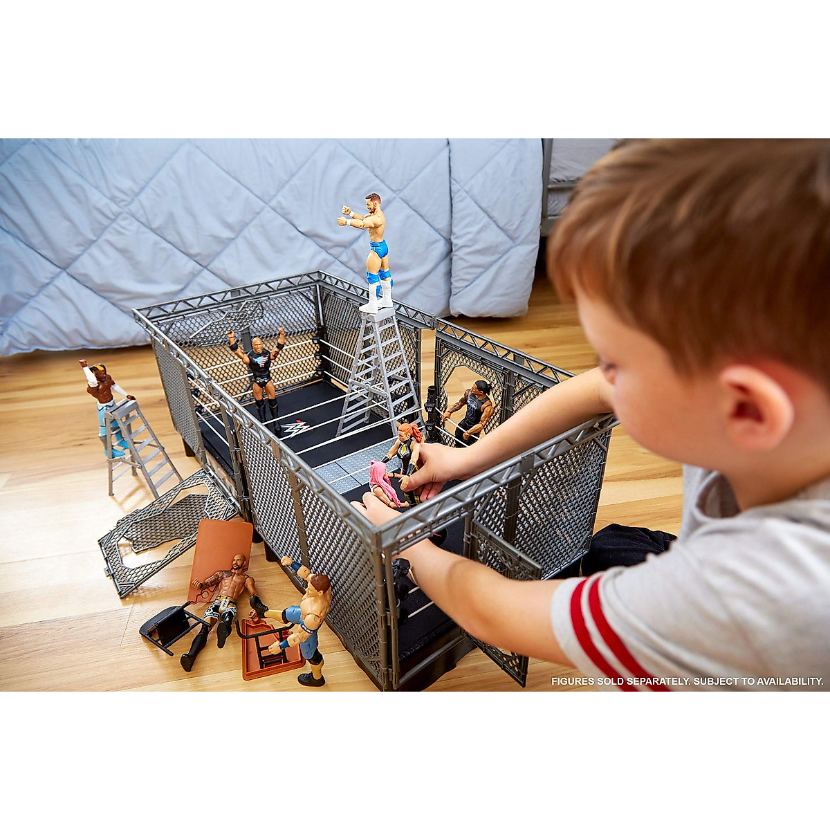 WWE MATTEL NXT Takeover War Games Playset with 2 NXT Rings, 2 Connecting Cages with Breakaway Pieces, 2 Ladders, Chair, Table & More; for Ages 6 Years