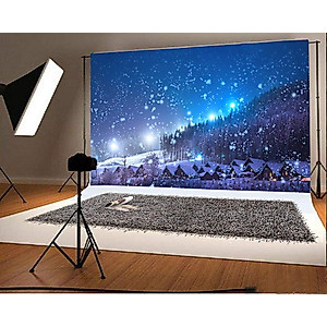 Leowefowa 7X5FT Christmas Backdrop Rustic Village Night View Forest Trees Snowing Shining Lights Blue Sky Winter Xmas Vinyl Photography Background Kids Children Adults Photo Studio Props