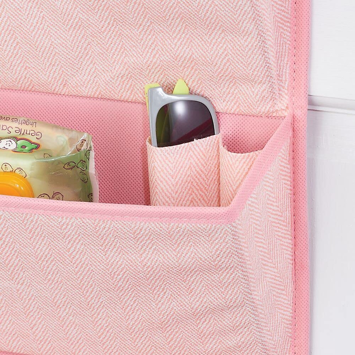 mDesign Soft Fabric Wall Mount/Over Door Hanging Storage Organizer - 4 Large Pockets for Child/Kids Room or Nursery, Hooks Included - Herringbone Print - Pink