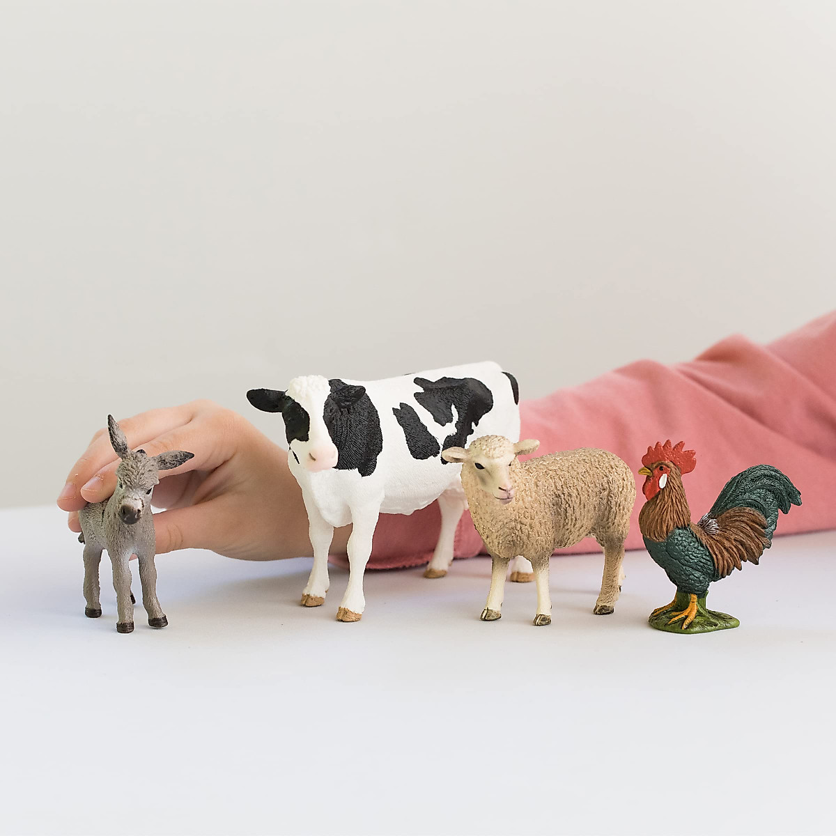 Schleich Farm World - Starter Set, Includes 4 x Collectible Toy Farm Animals, Cow, Sheep, Donkey Foal and Rooster Farm Animal Toys for Kids Ages 3+