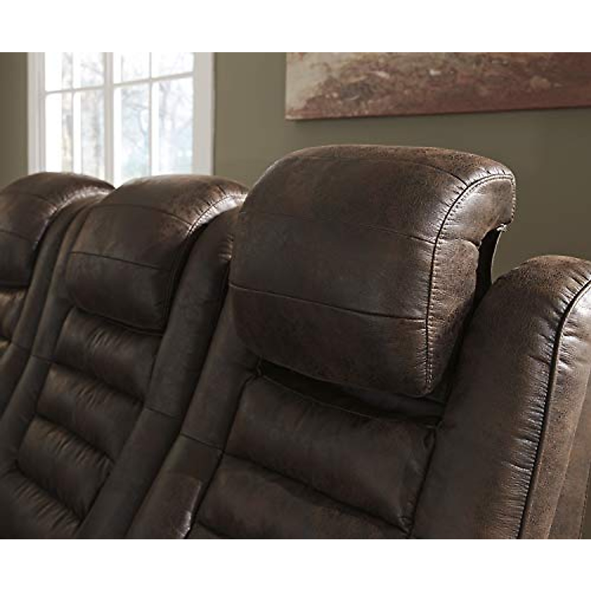 Signature Design by Ashley Game Zone Faux Leather Adjustable Power Reclining Sofa with Cup Holders and Storage, Brown