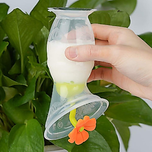 haakaa Manual Breast Pump Hand Pump Milk Pump Breast Milk Collector with Suction Base and Flower Stopper 100% Food Grade Silicone BPA Free (4oz/100ml) (Orange)