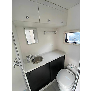 Offroad Caravans Trailer with Bedroom/Living Room/Bathroom and Kitchen.White and Black Color.