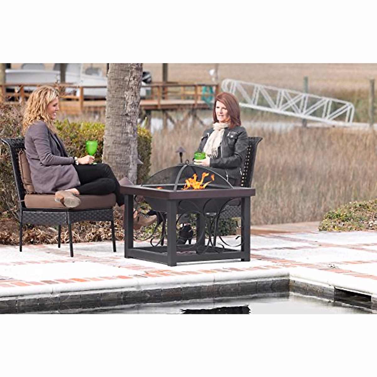 Fire Sense 61331 Fire Pit Cocktail Square Table Wood Burning Steel Mesh Spark Screen Wood Grate Screen Lift Steel Firepit with Log Storage Rack - Hammer Tone Bronze Finish