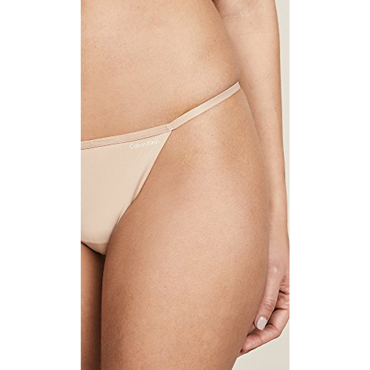 Calvin Klein Women's Sleek Model Thong Panty, Bare, Small