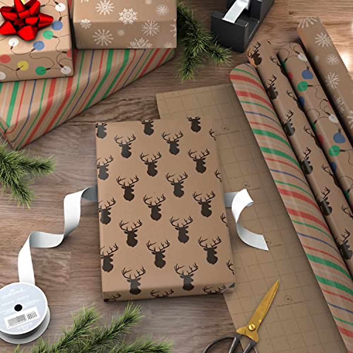Hallmark Recyclable Christmas Wrapping Paper for Kids with Cut Lines on Reverse (4 Rolls: 88 sq. ft. ttl) Kraft Brown with Christmas Lights, Deer, Snowflakes, Red, Green, Blue Stripes