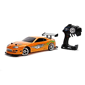 Jada Toys Fast & Furious 1:10 Toyota Supra Remote Control Car Drift Slide RC with Extra Tires 2.4GHz, Toys for Kids and Adults, Orange,black
