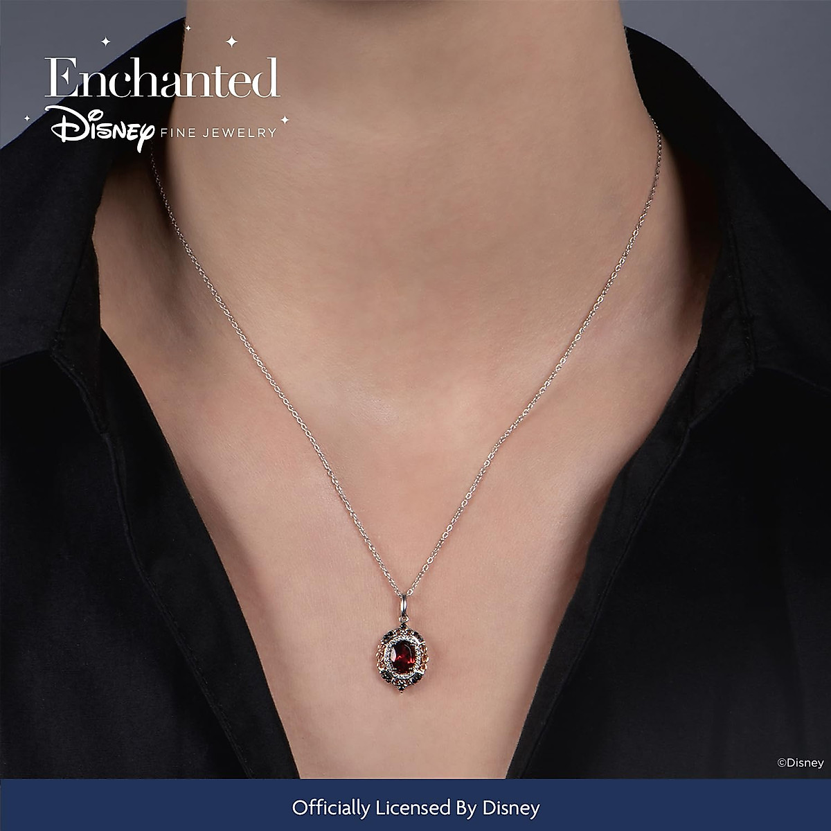 Jewelili Enchanted Disney Fine Jewelry Sterling Silver and 10K Rose Gold 8x6 MM Oval Shape Red Garnet with 1/5 Cttw Black and White Natural Round Diamonds Evil Queen Pendant Necklace 18" Cable Chain