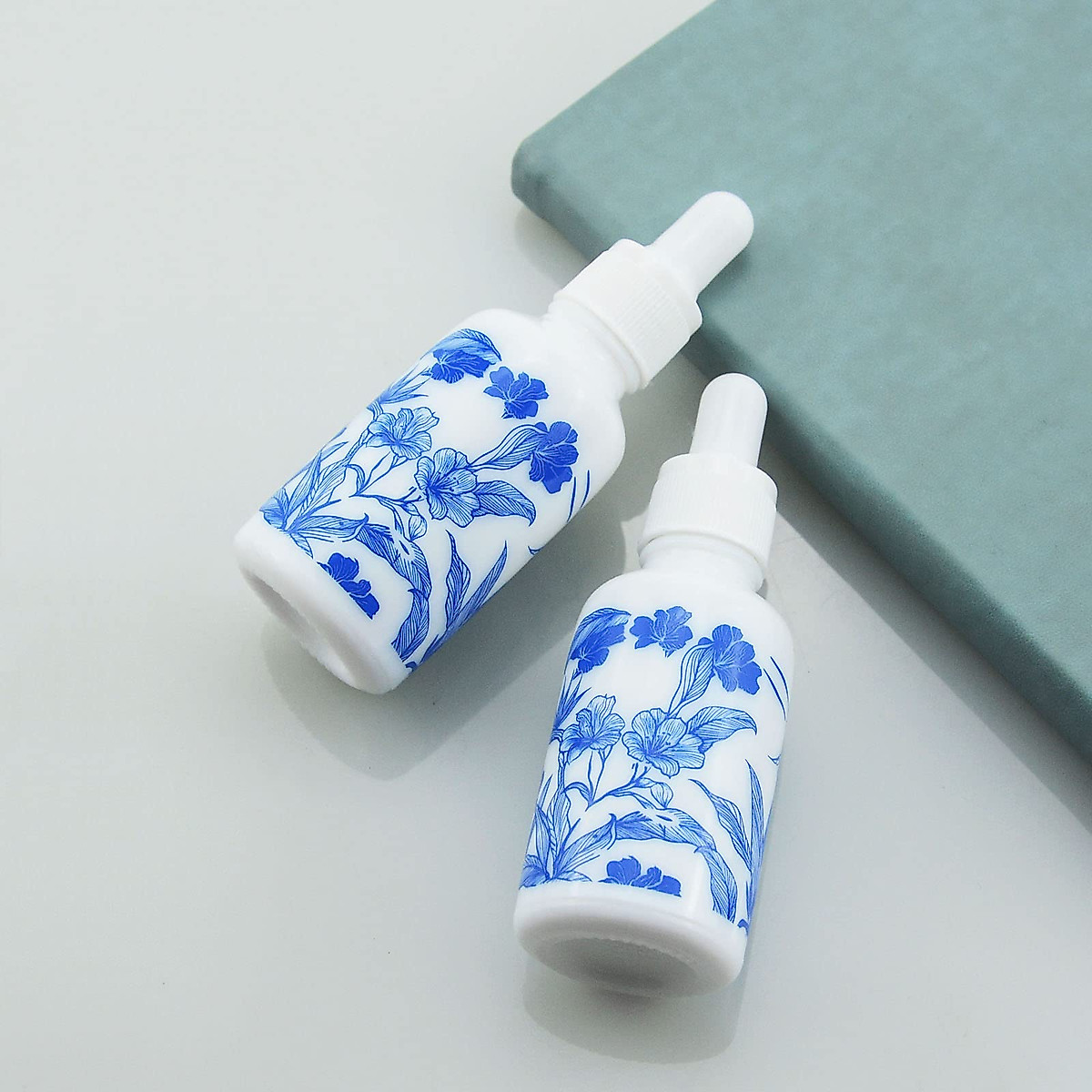 Wwolife 4 PCS 1 2/3oz (50ml) Blue and White Porcelain Ceramic Dropper Bottles Perfume Aromatherapy Cosmetic Container Essential Oils Sample Empty Dropper Bottles with Funnel Include